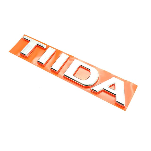 Emblema Nissan Tiida / 2007/... - Fuscão Preto